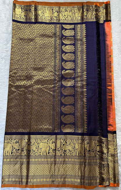 Gadwal Pattu Orange Colored Checks Saree Complemented With a Pattu Ink ...