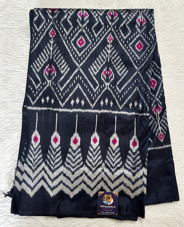 Ikkat Pattu Saree Gray colored Saree complemented with a ikkat border ...