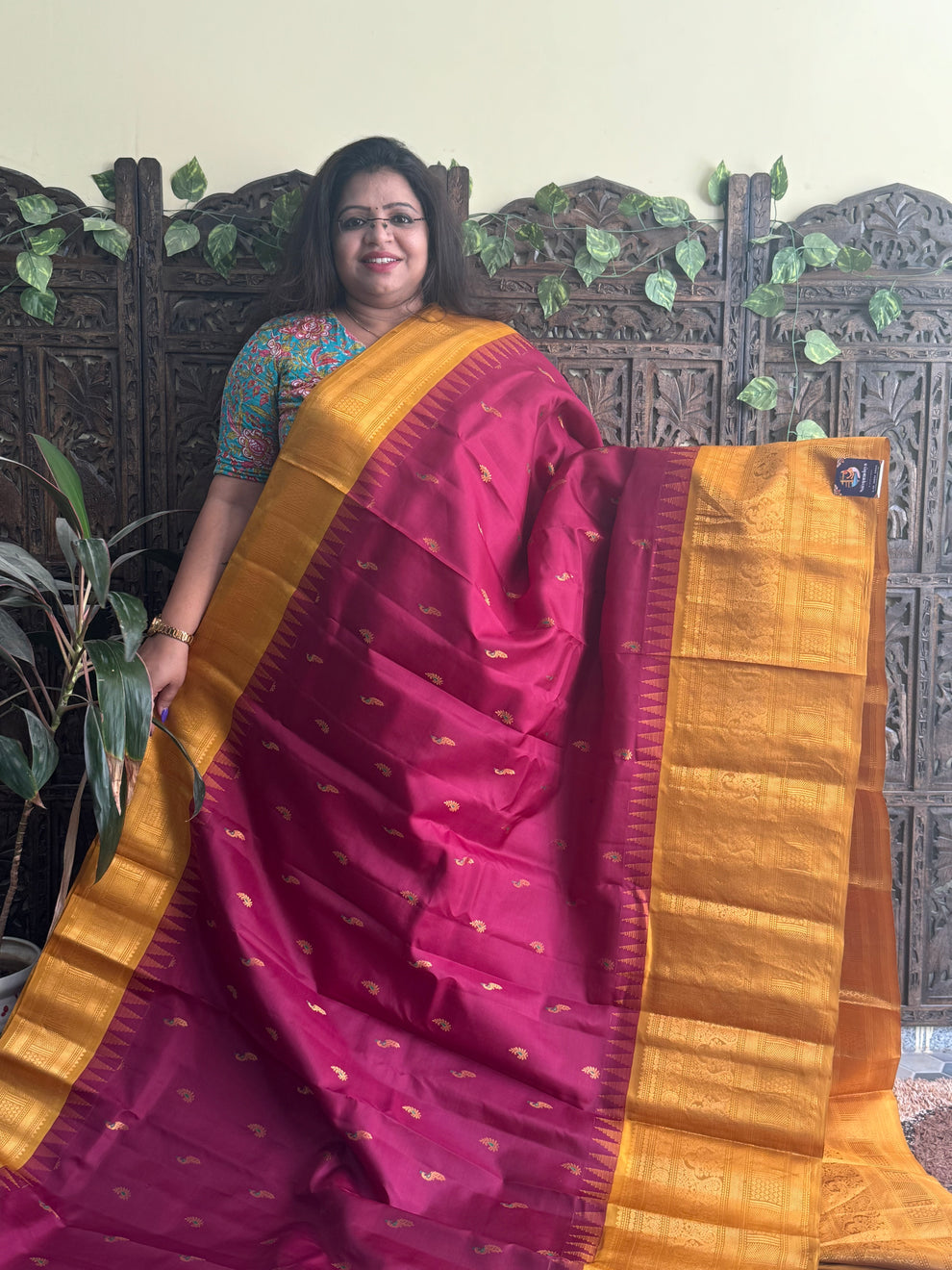 Gadwal Pattu Saree Maroon colored with a Mustard Zari border ...