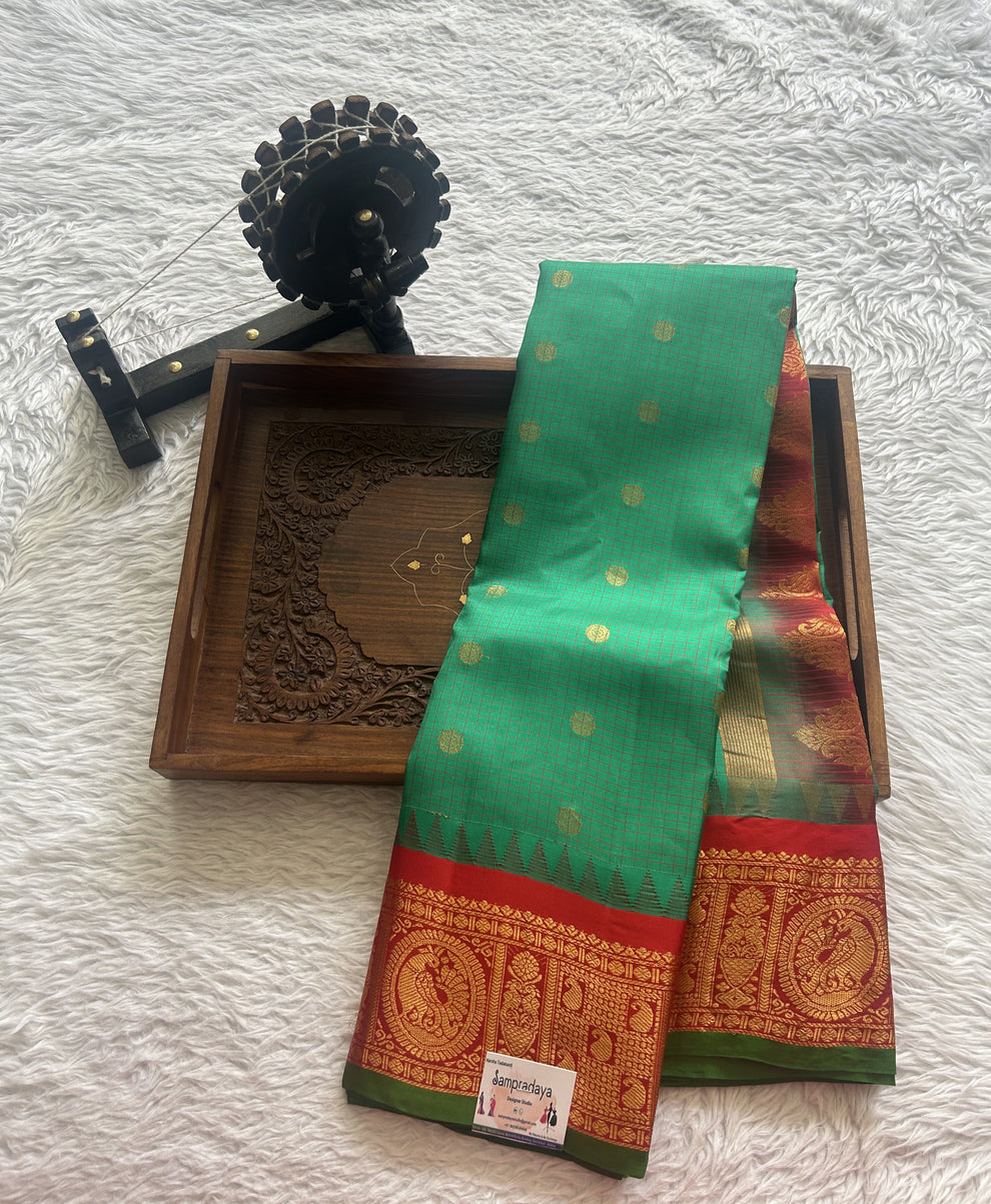 Gadwal Pattu Saree Dark Green colored with a Zari border – Sampradaya ...
