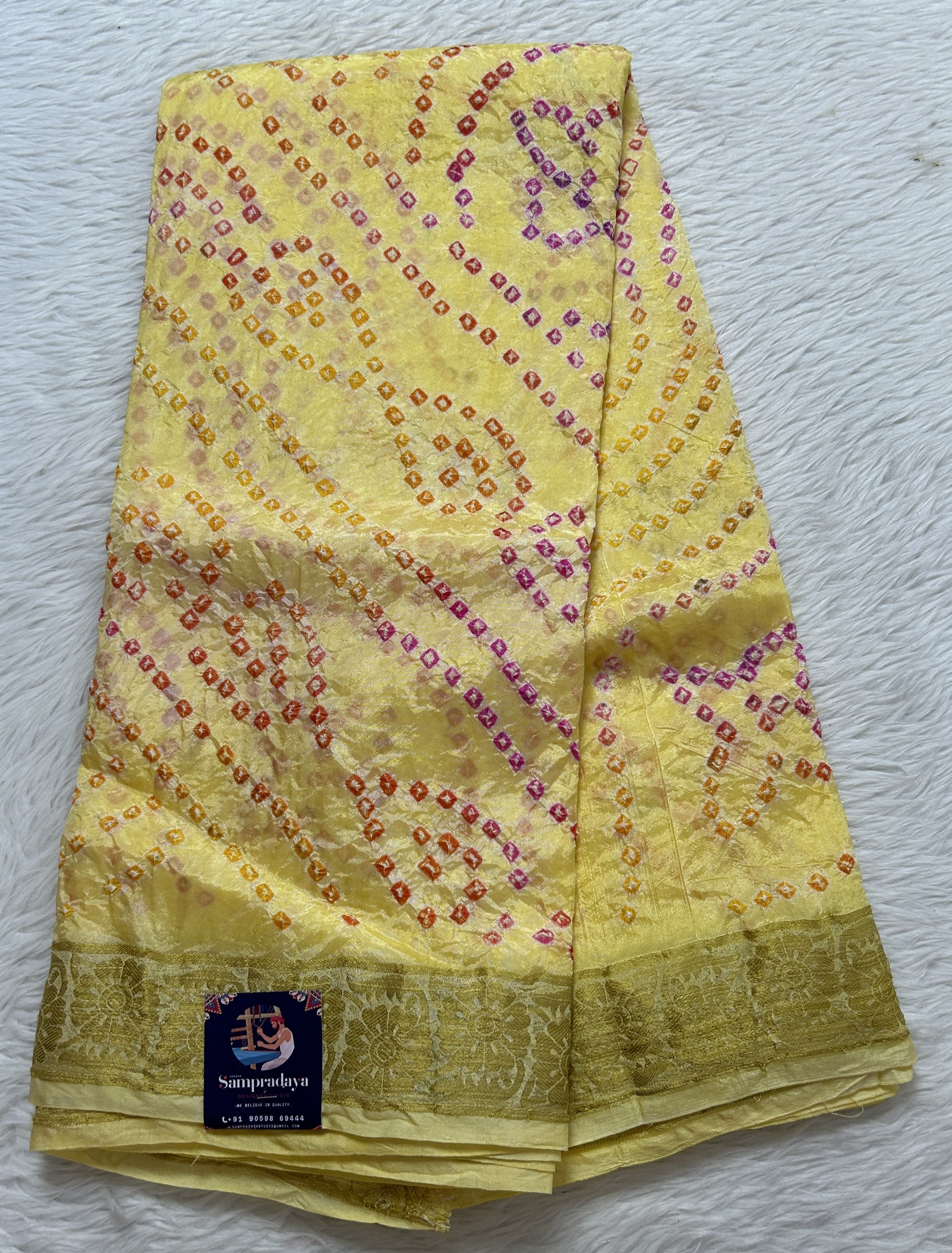 Bandhani Saree Yellow Color Complemented with a Zari Border ...